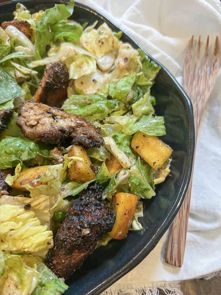 Jerk Chicken Caesar Salad by Triangle Traveling Caveman - FoodSocial