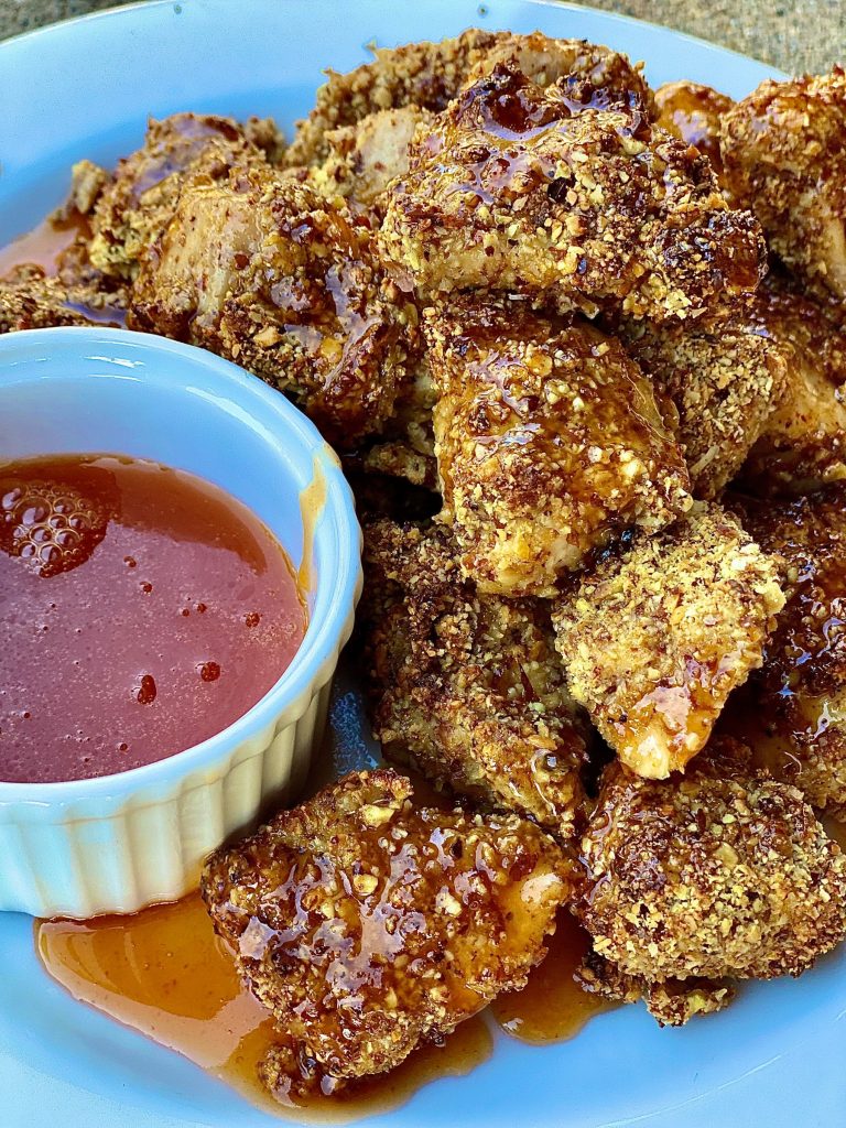 Hot Honey Sriracha Chicken Bites by Nut Crumbs - FoodSocial