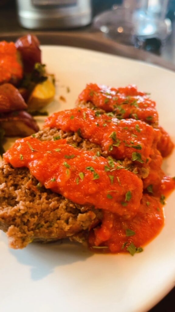 Meatloaf With Roasted Red Pepper Sauce by Christine Hryniszak - FoodSocial